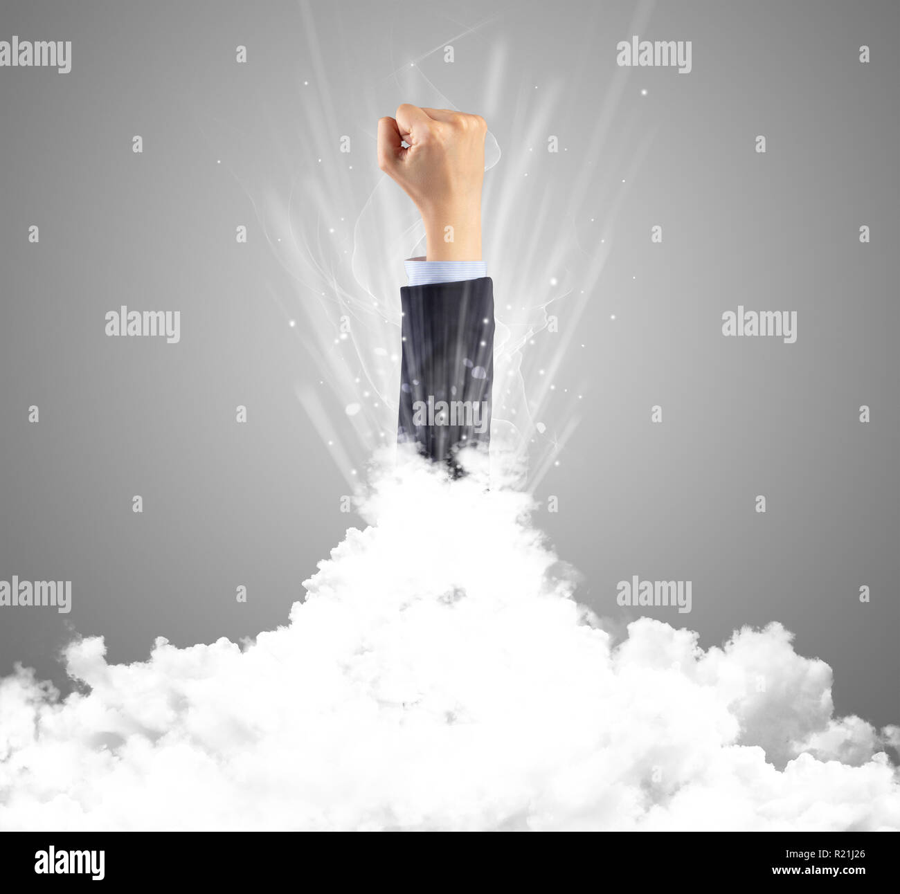 Hand breaking out from cloud Stock Photo - Alamy