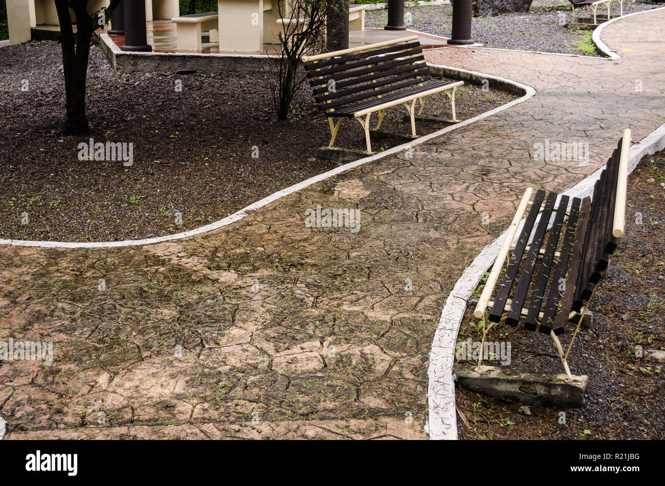 bench on a red brick road in a beautiful outdoor park, beautiful ...