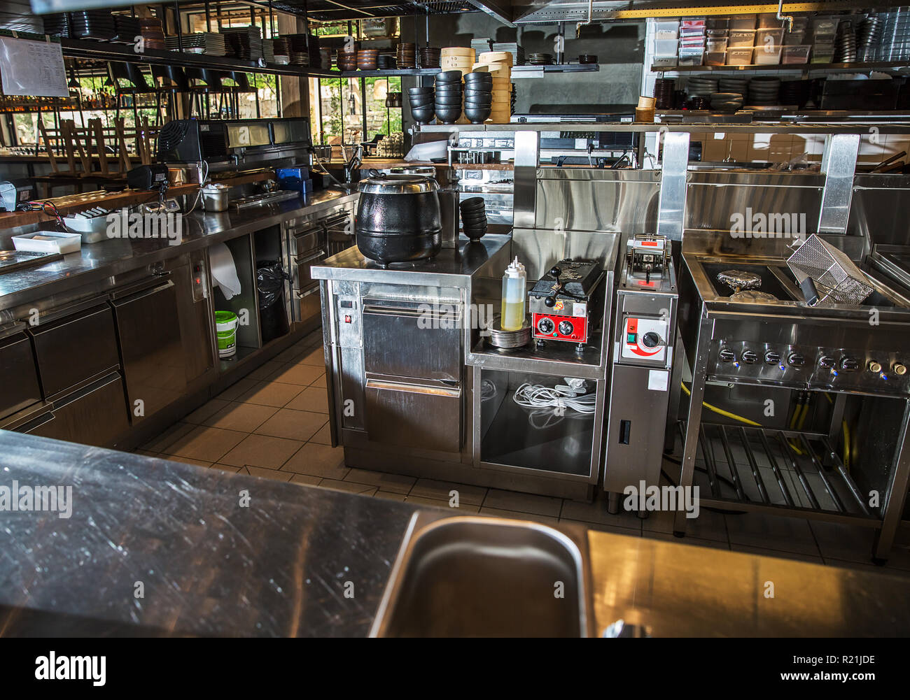 Professional kitchen, view counter in stainless steel Stock Photo - Alamy