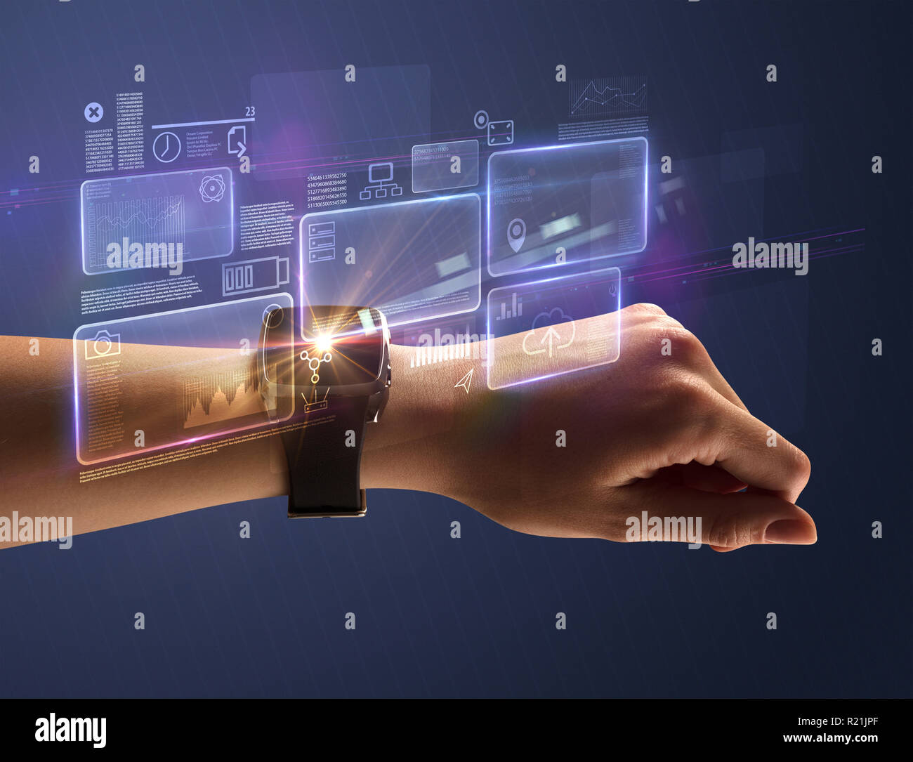 Female hand wearing smartwatch with statement labels around and dark ...