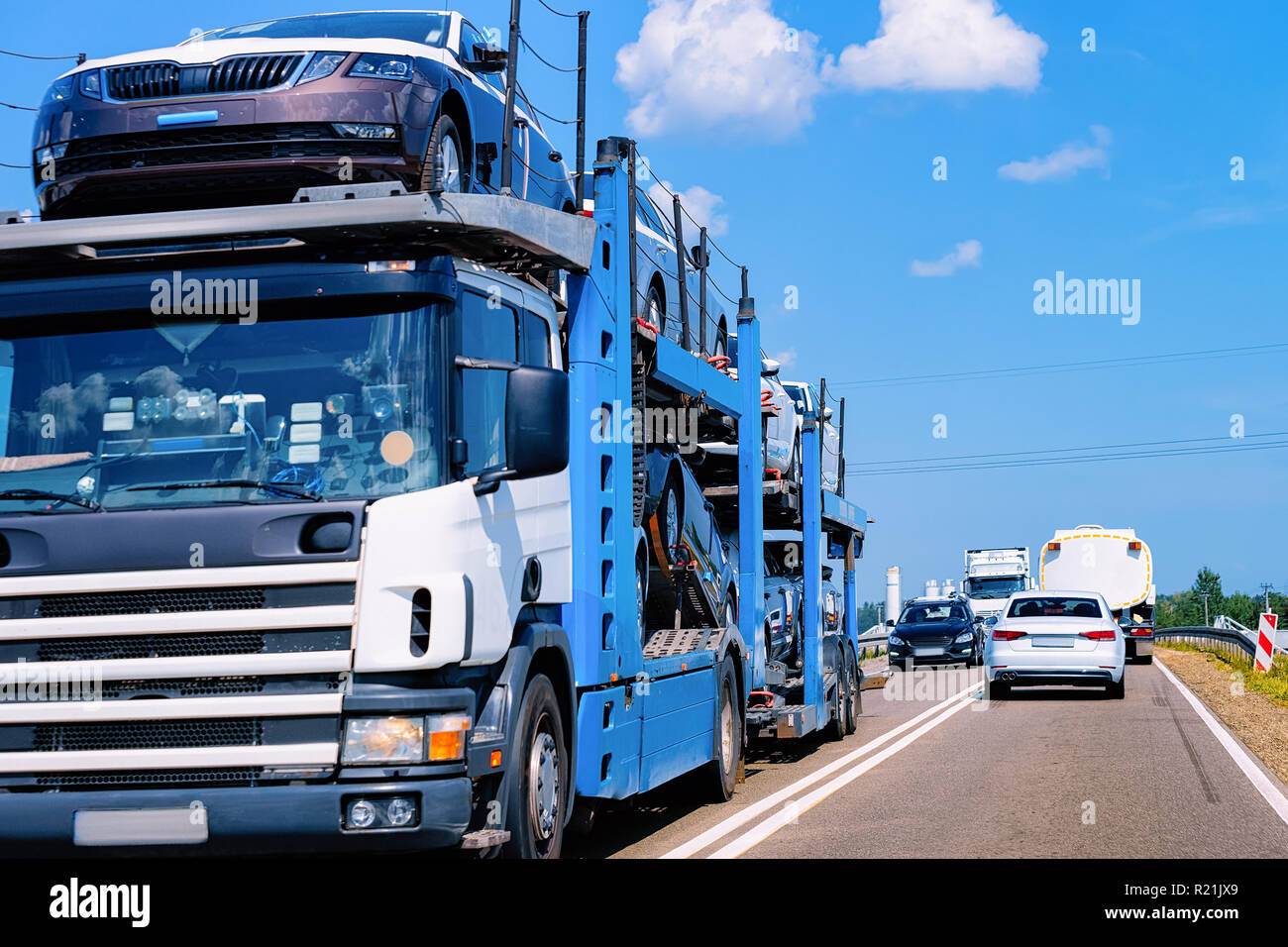 Cars carrier on the road, in Poland. Truck transporter Stock Photo - Alamy