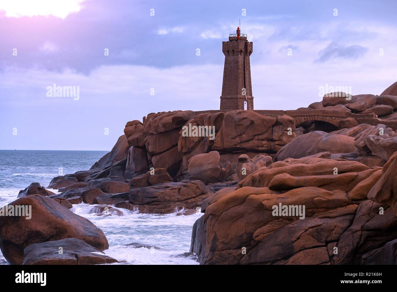 lighthouse Phare de Men Ruz and typical Brittany coast at the Tregastel ...