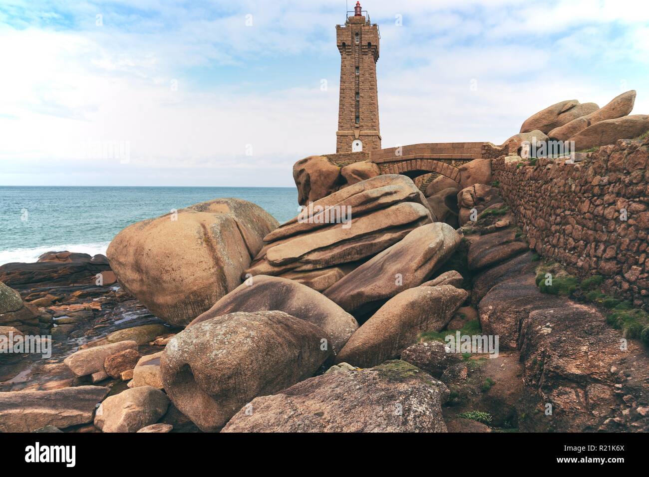 lighthouse Phare de Men Ruz and typical Brittany coast at the Tregastel ...