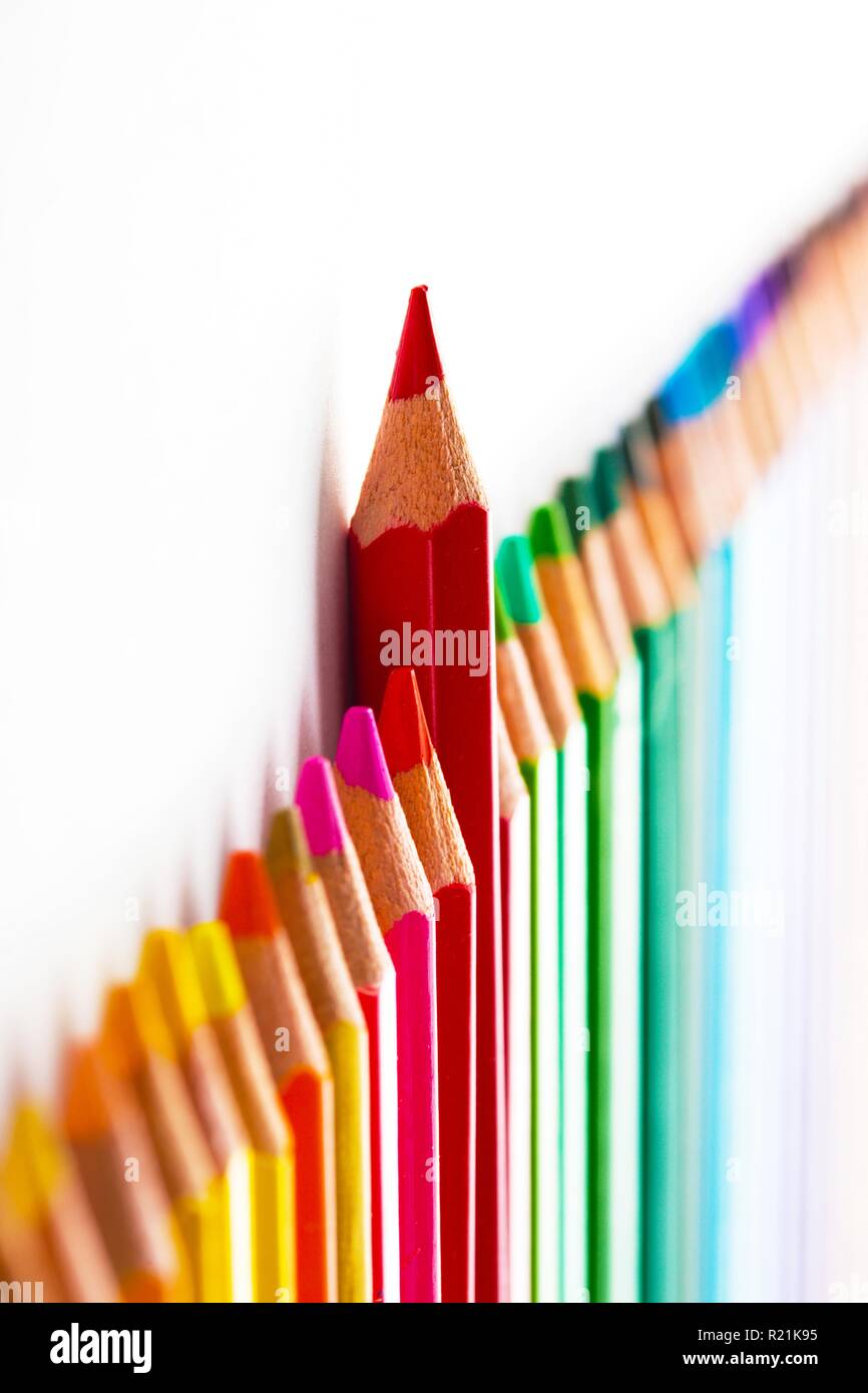 leadership concept with one pencil standing out of crowd of other ...