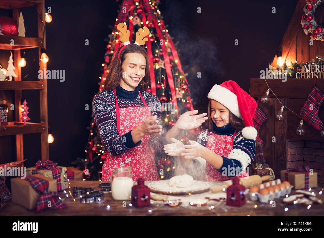Merry Christmas and Happy Holidays. Family preparation holiday food ...