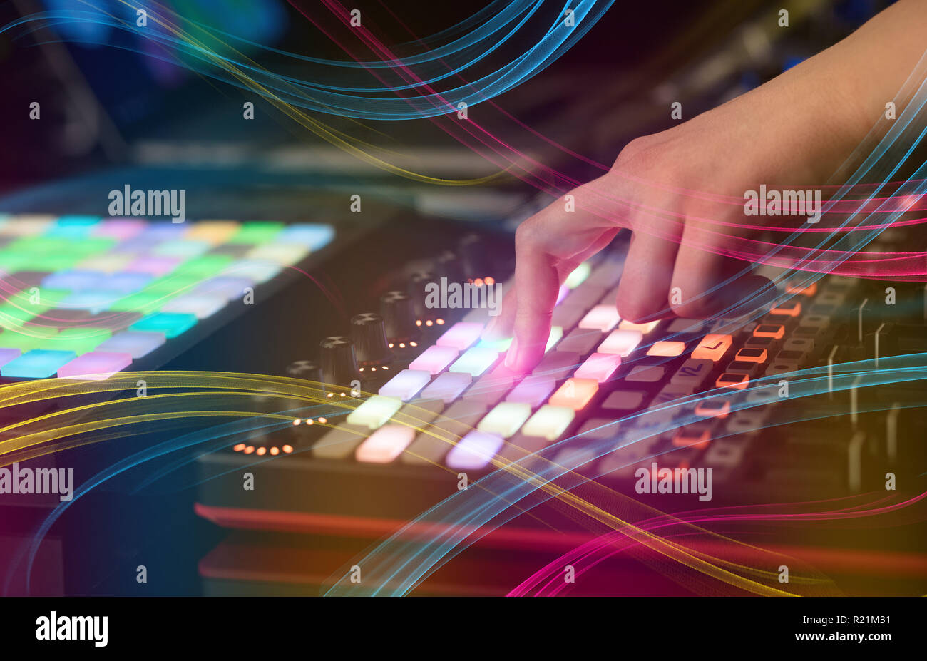 Hand mixing music on midi controller with colorful vibe concept Stock ...