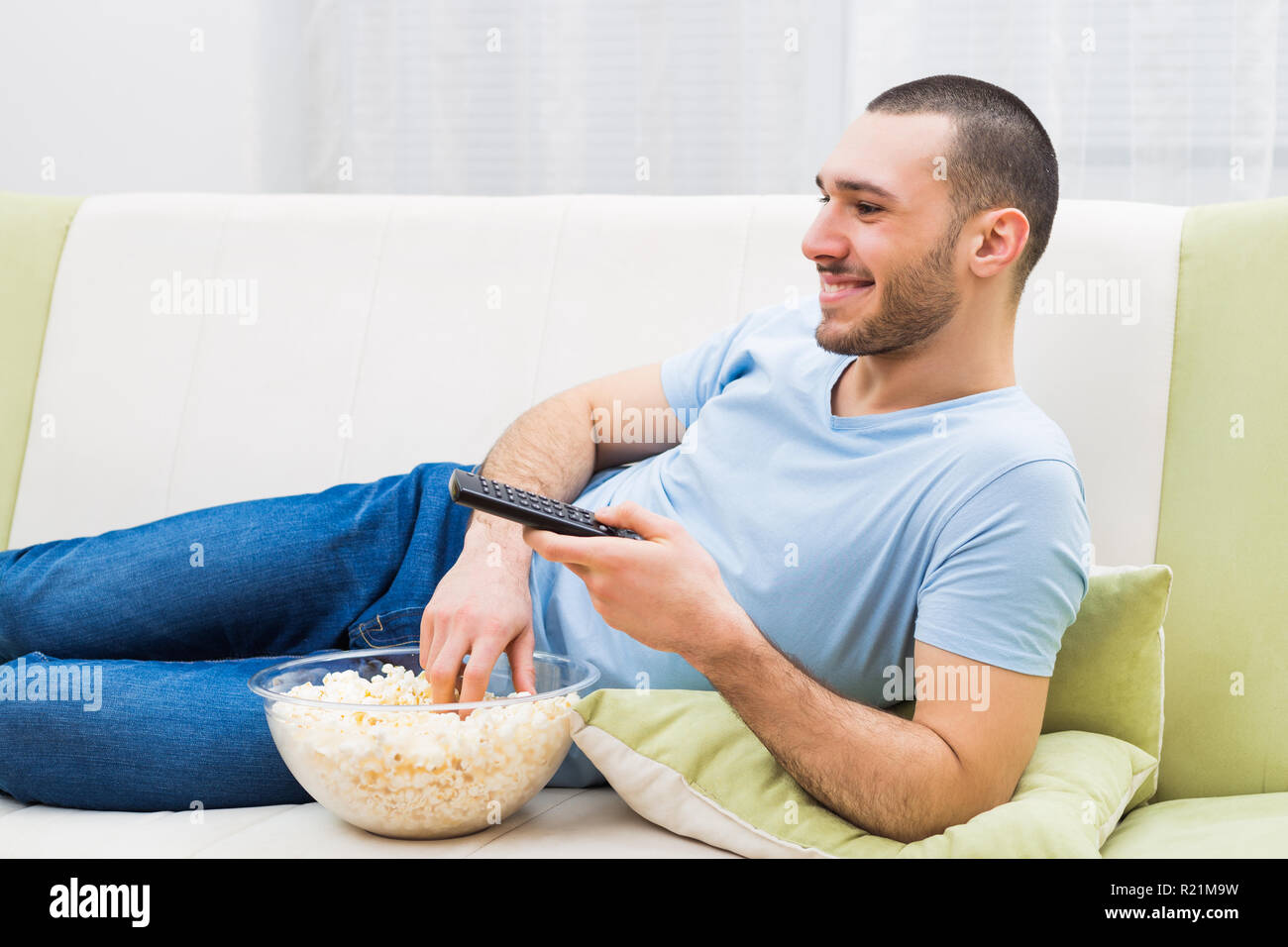 Young man enjoys eating hi-res stock photography and images - Alamy