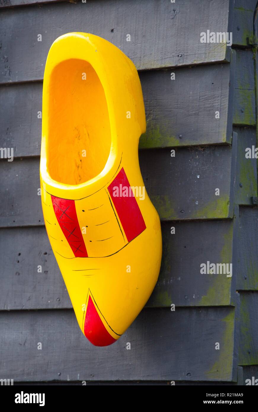 souvenir traditional dutch wooden shoes klomp on a wooden wall Stock ...
