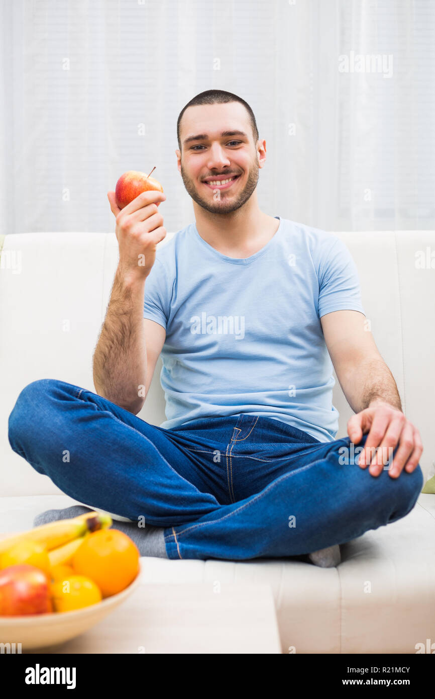 Man eating snack energy hi-res stock photography and images - Alamy