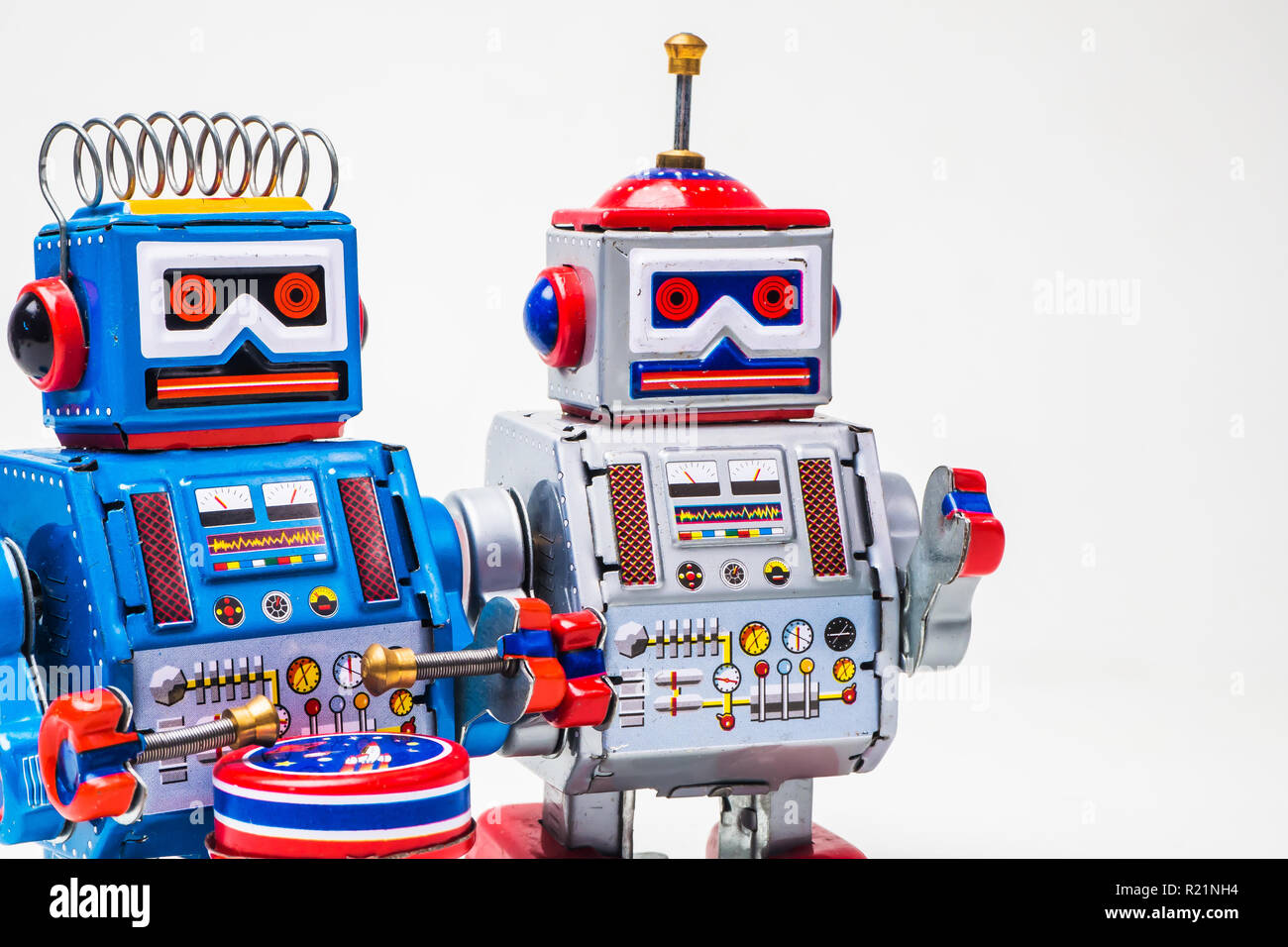 robot tin toy on white background Stock Photo - Alamy