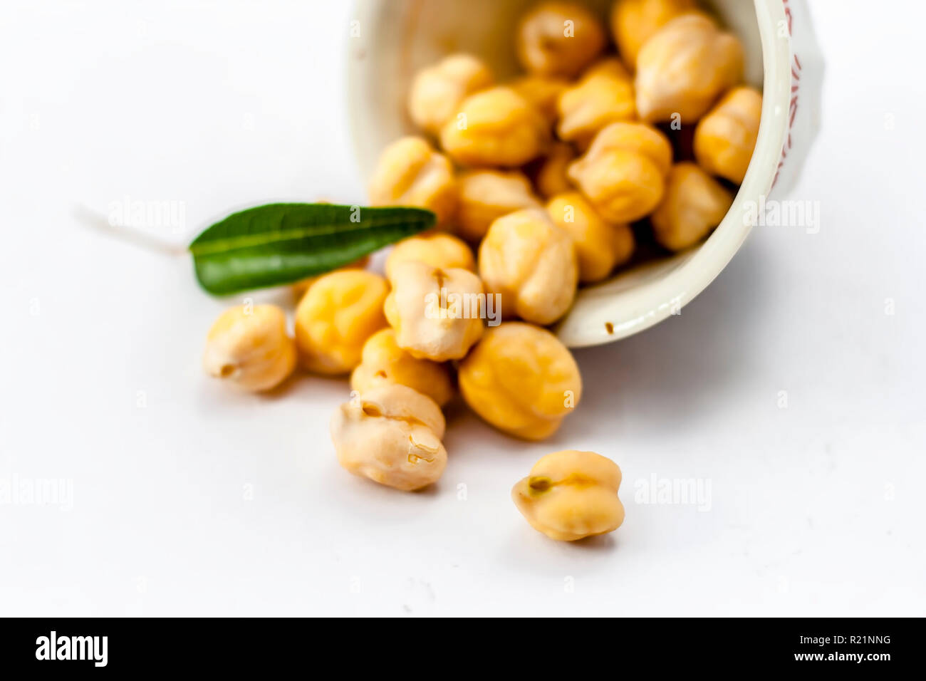 Raw bright dark brown colored Desi chana or original chickpea in a ...