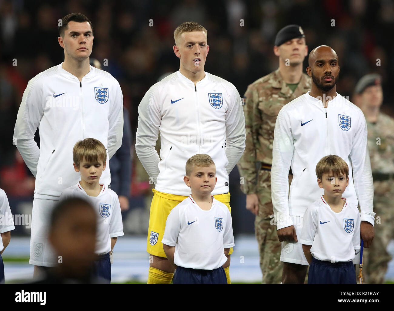 England's Michael Keane (left), Jordan Pickford (centre) and Fabian ...