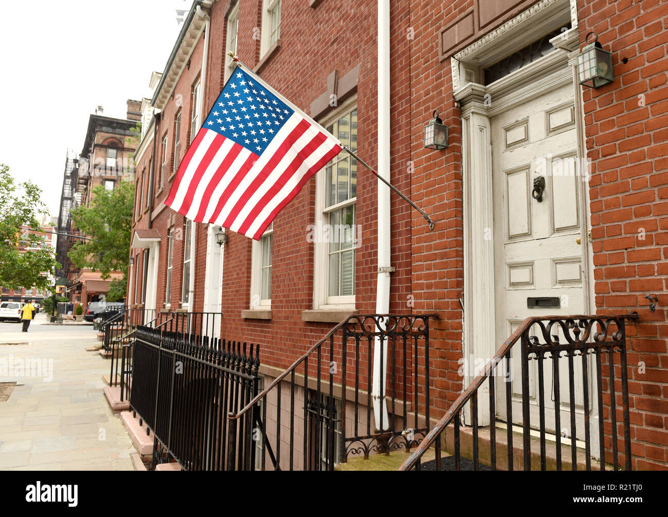 Us flags on buildings hi-res stock photography and images - Alamy
