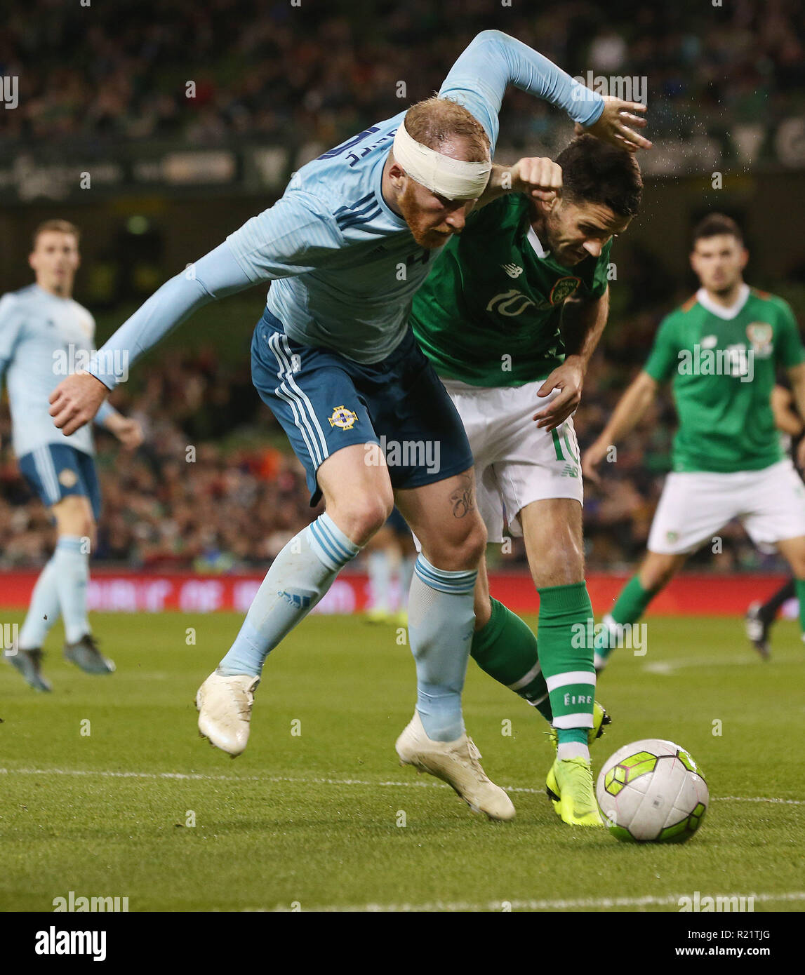 Republic of Ireland's Robbie Brady (right) and Northern Ireland's Liam ...