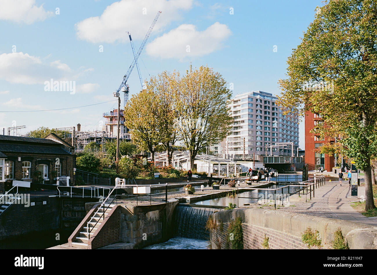 St Pancras Lock on the Regents Canal at the newly developed Gasholder ...