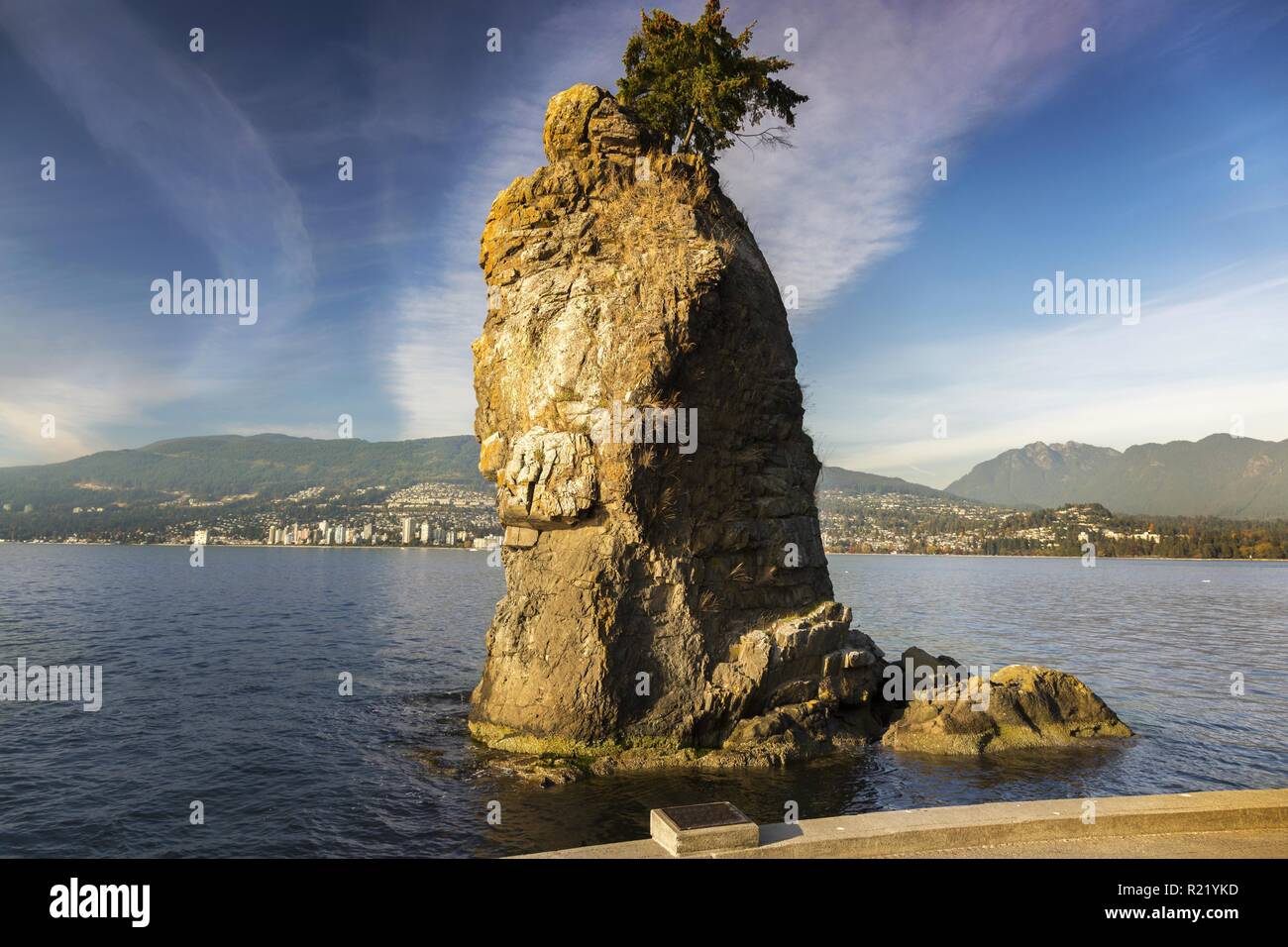 Siwash Rock, Squamish name Skaish, a famous rock outcropping formation ...