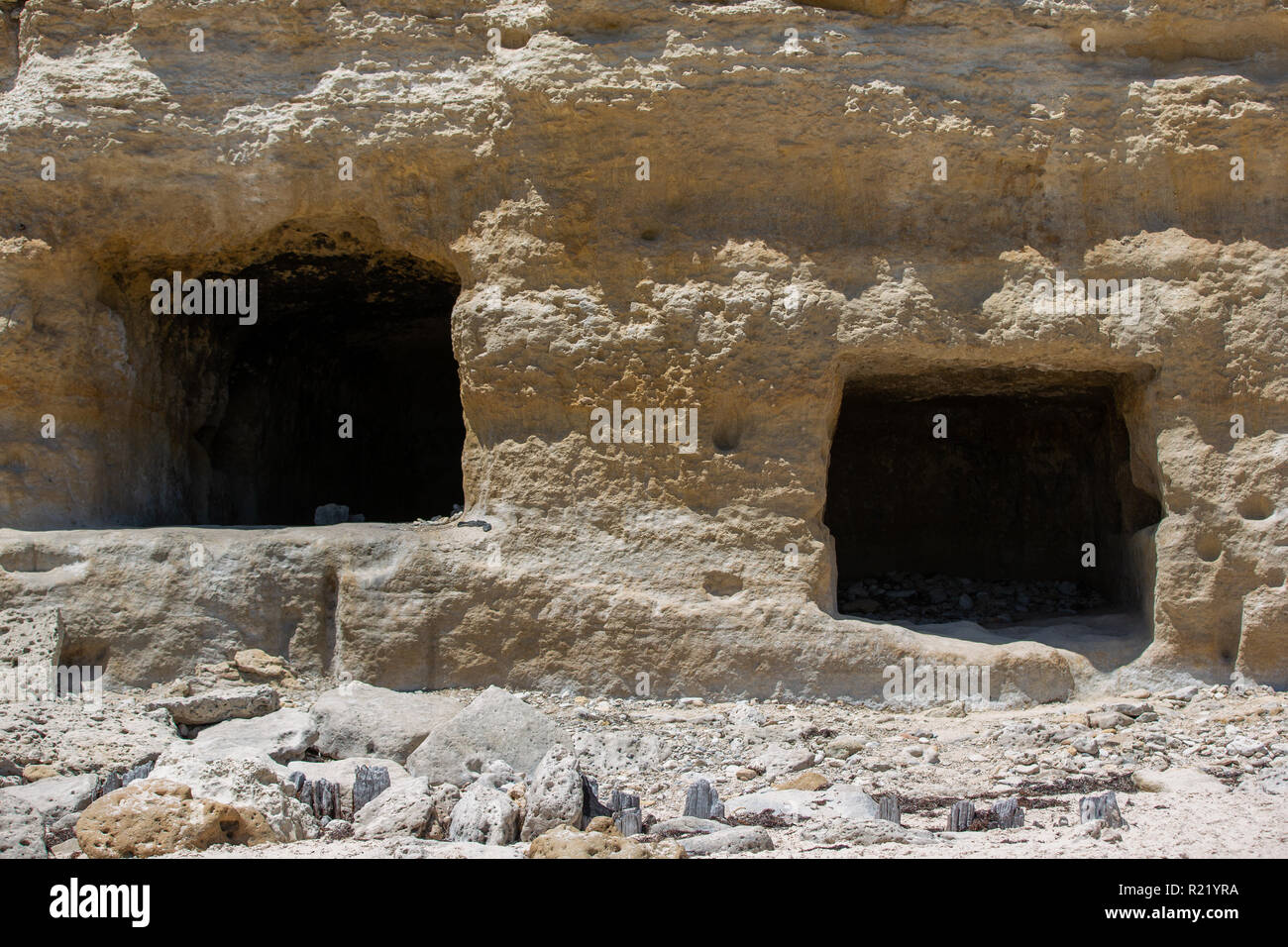 The beautiful Port Willunga cliffs with historic boat shelters carved ...