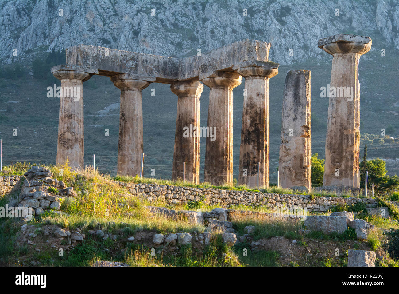 The ruins of a temple in old Corinth dedicated to Apollo Stock Photo ...