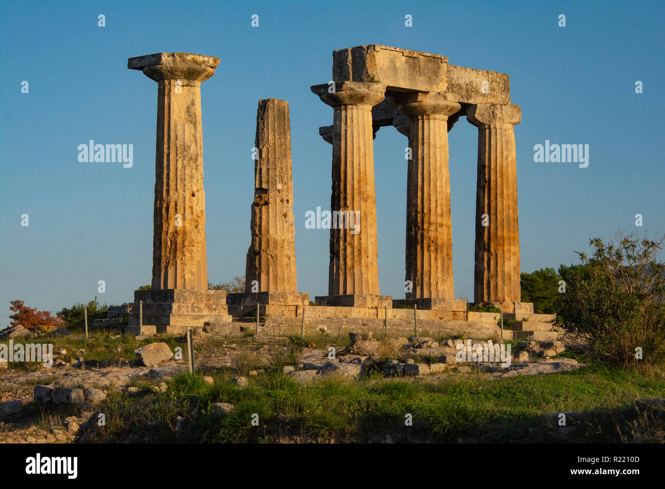 The ruins of a temple in old Corinth dedicated to Apollo Stock Photo ...