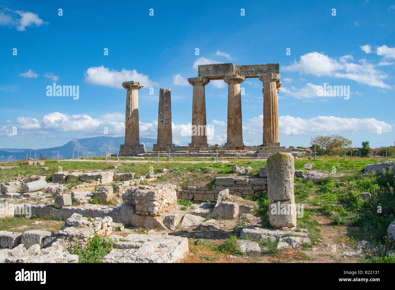 The ruins of a temple in old Corinth dedicated to Apollo Stock Photo ...