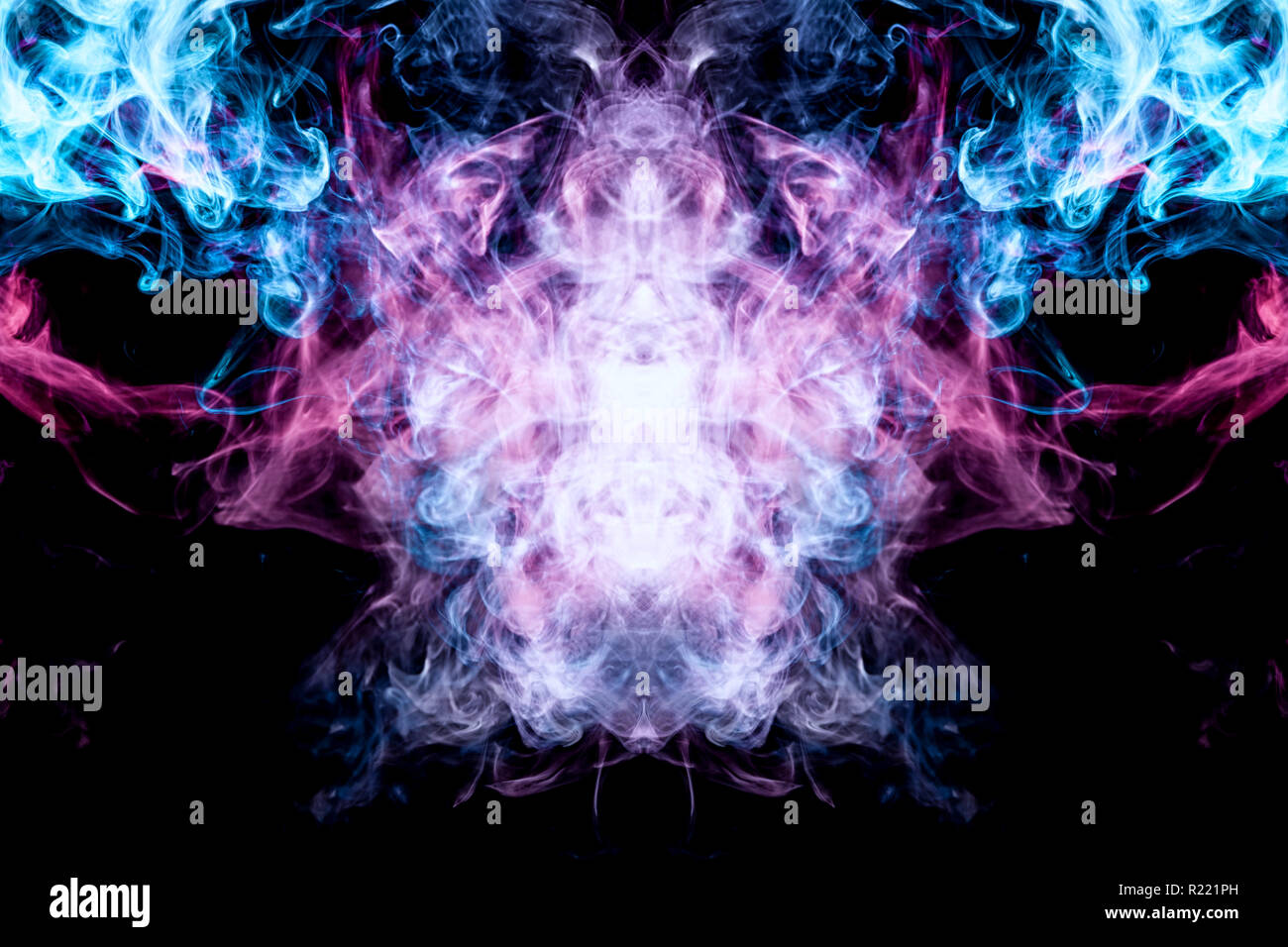 Abstract magic background. Cloud of pink and blue smoke in the form of ...