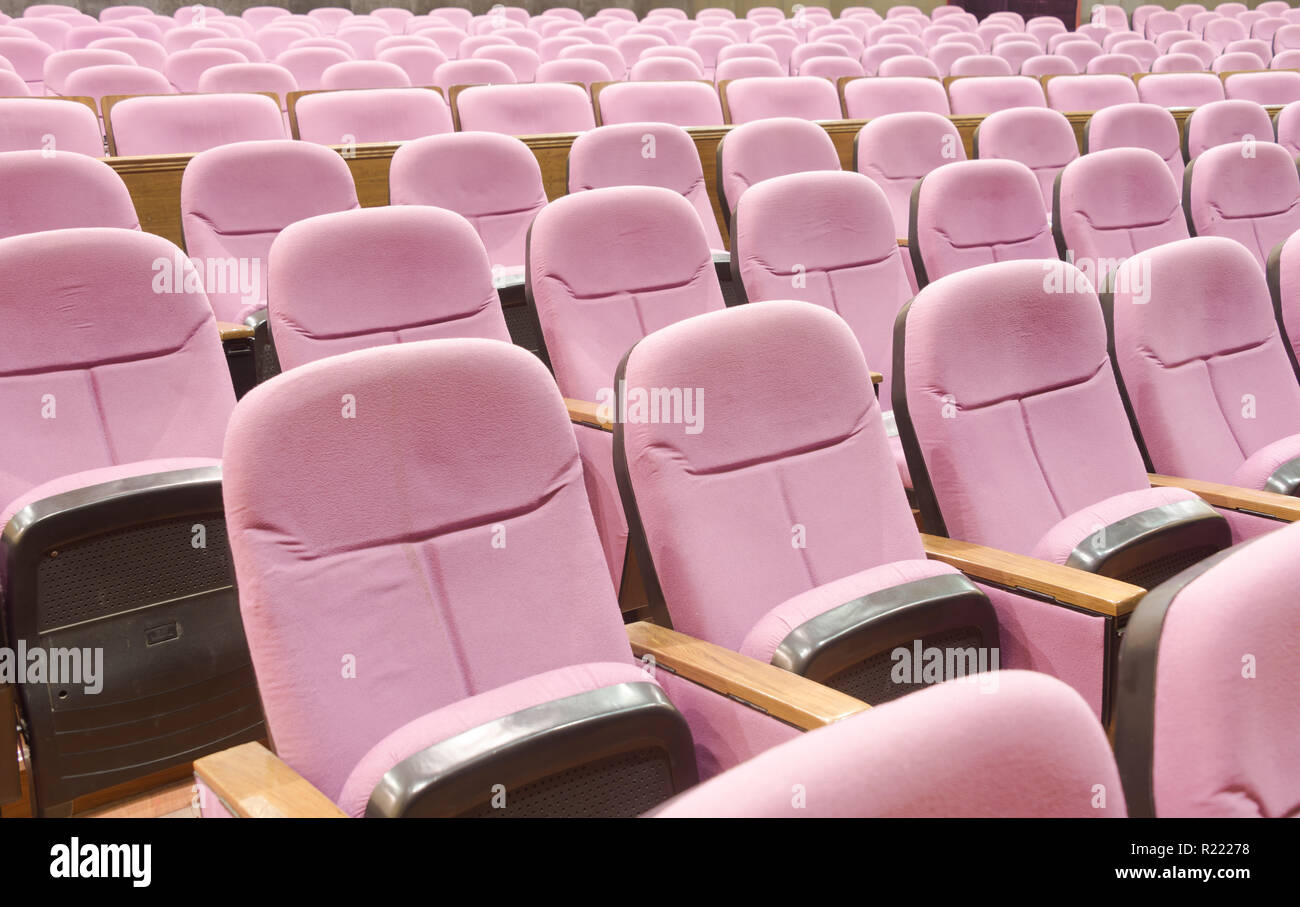 Empty movie theater with red seats Stock Photo - Alamy