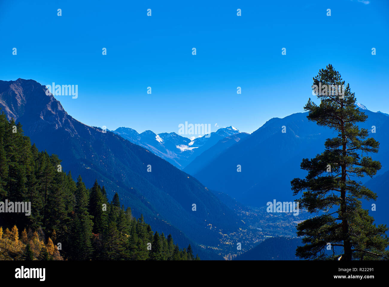 A small village surrounded by mountain peaks. Village Arkhyz, Karachay ...
