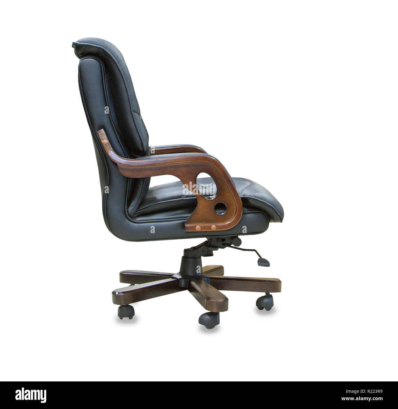 The profile view modern office chair from black leather. Isolated Stock ...