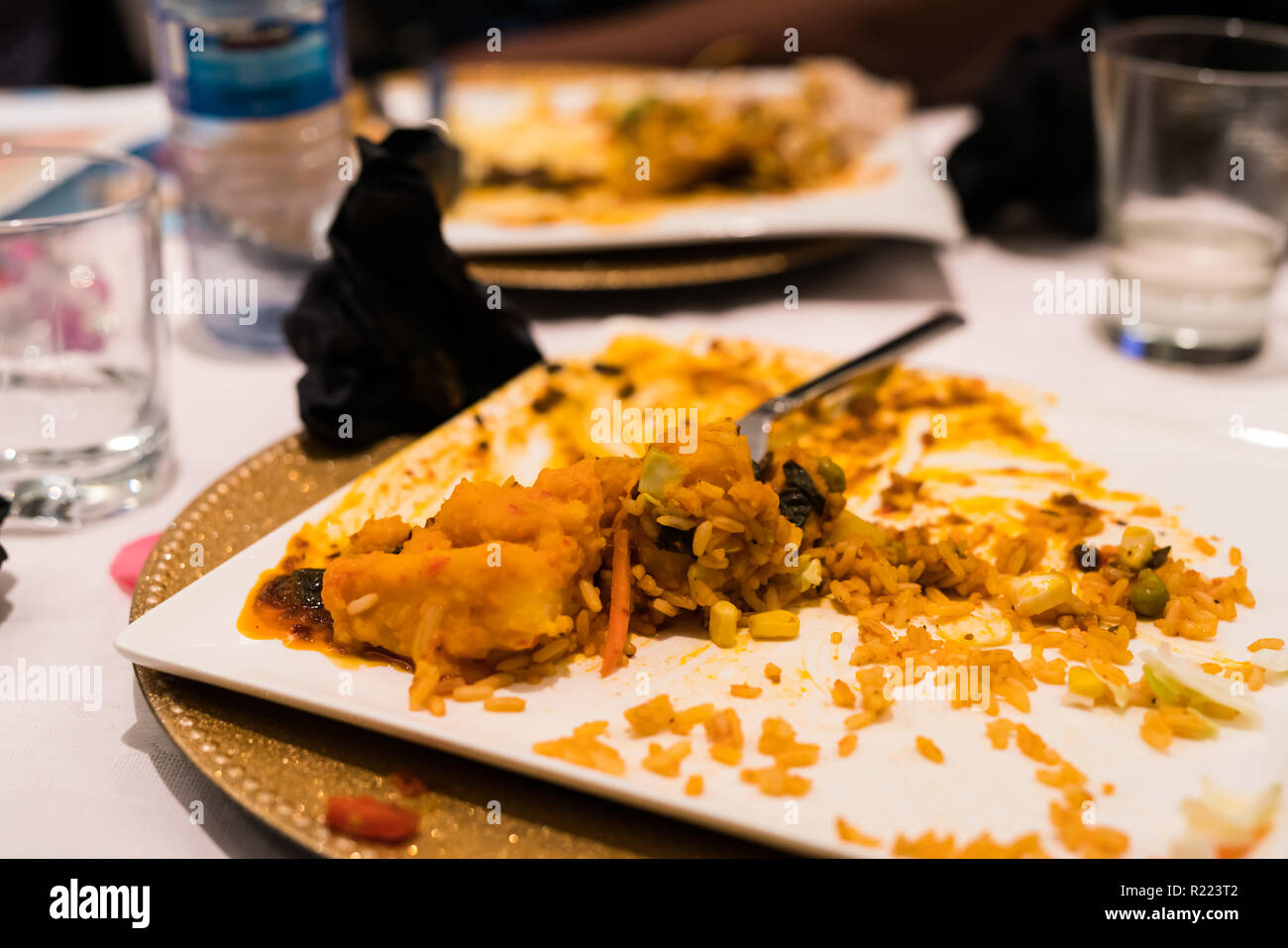 Leftovers on plate after serving dinner at party Stock Photo - Alamy