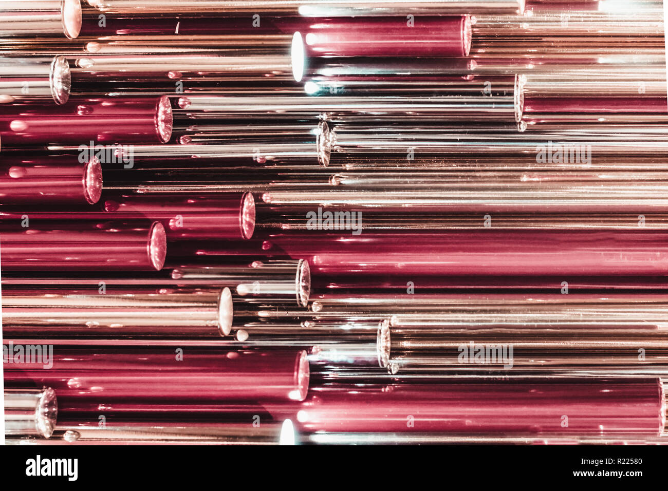 Colorful holographic metallic tube as texture. Iridescent wallpaper ...