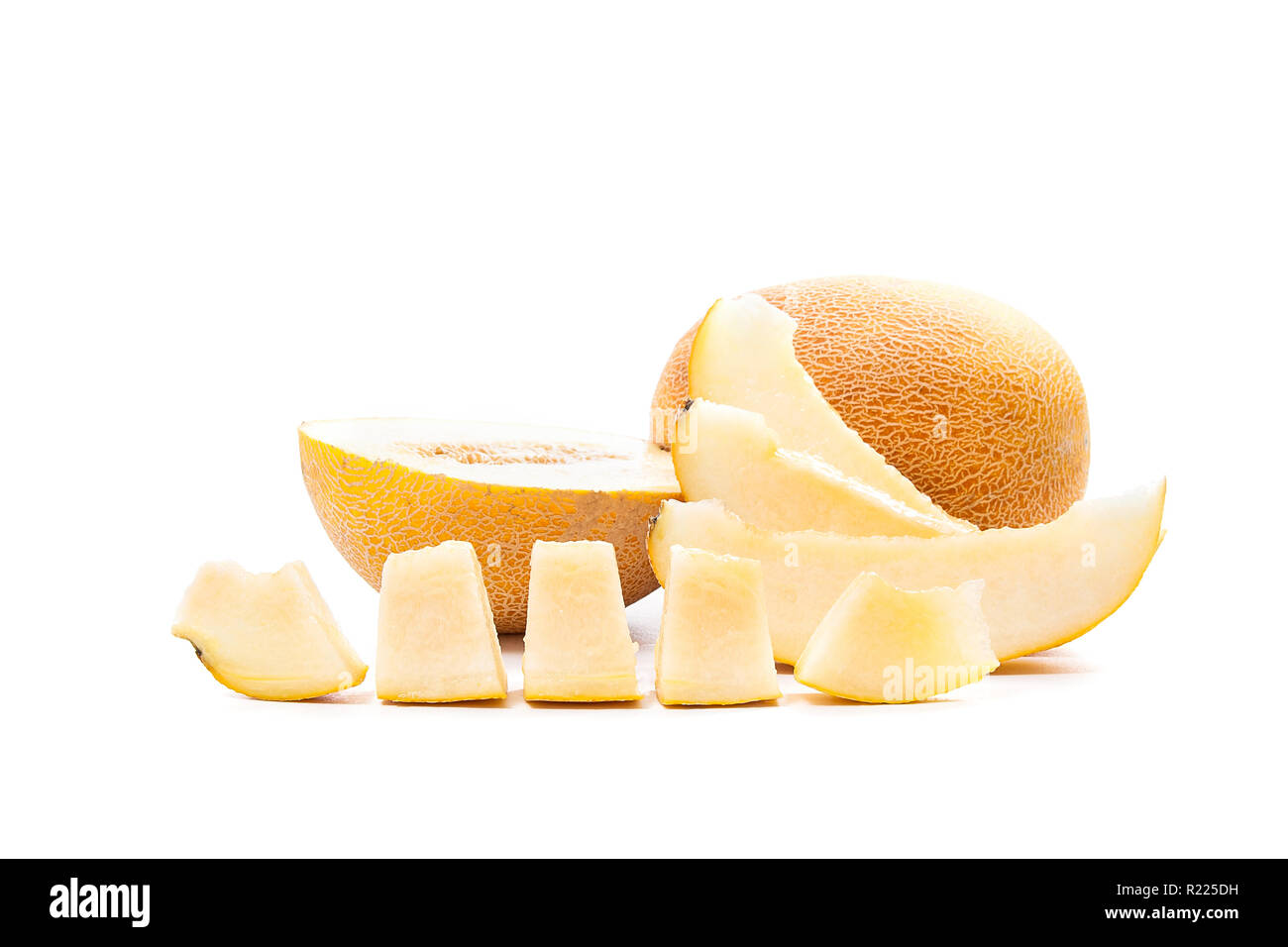 Whole, half and sliced ripe juicy melon tropical fruit at summer time ...
