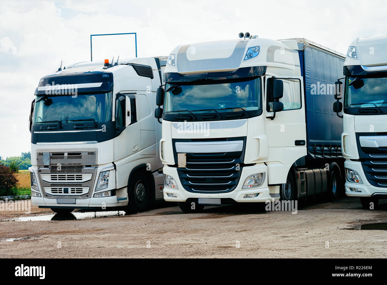 Trucks in the road in Poland. Lorry transport delivering some freight ...