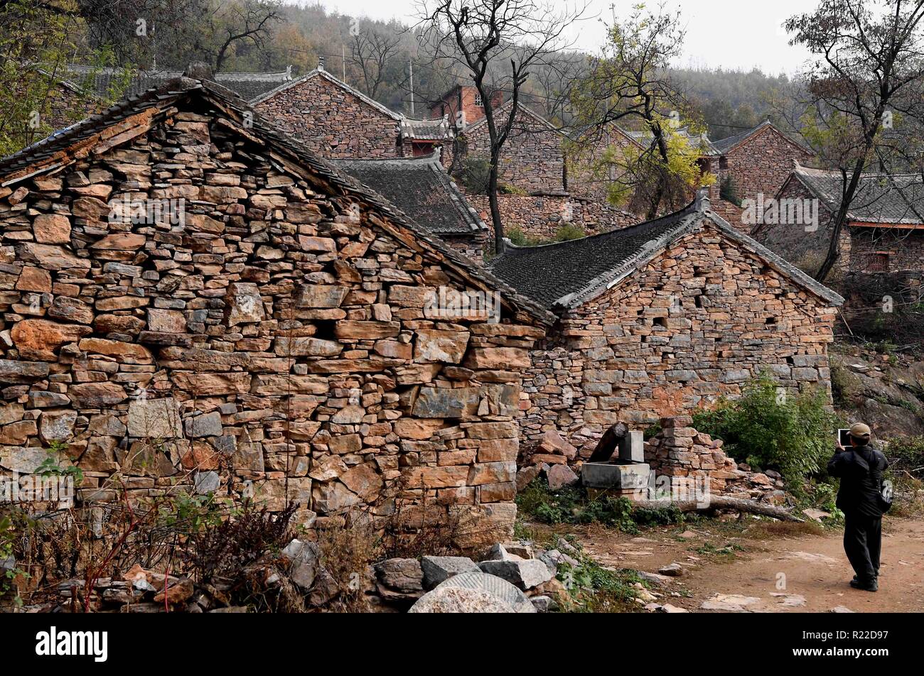 Neixiang, China's Henan Province. 15th Nov, 2018. A tourist takes ...