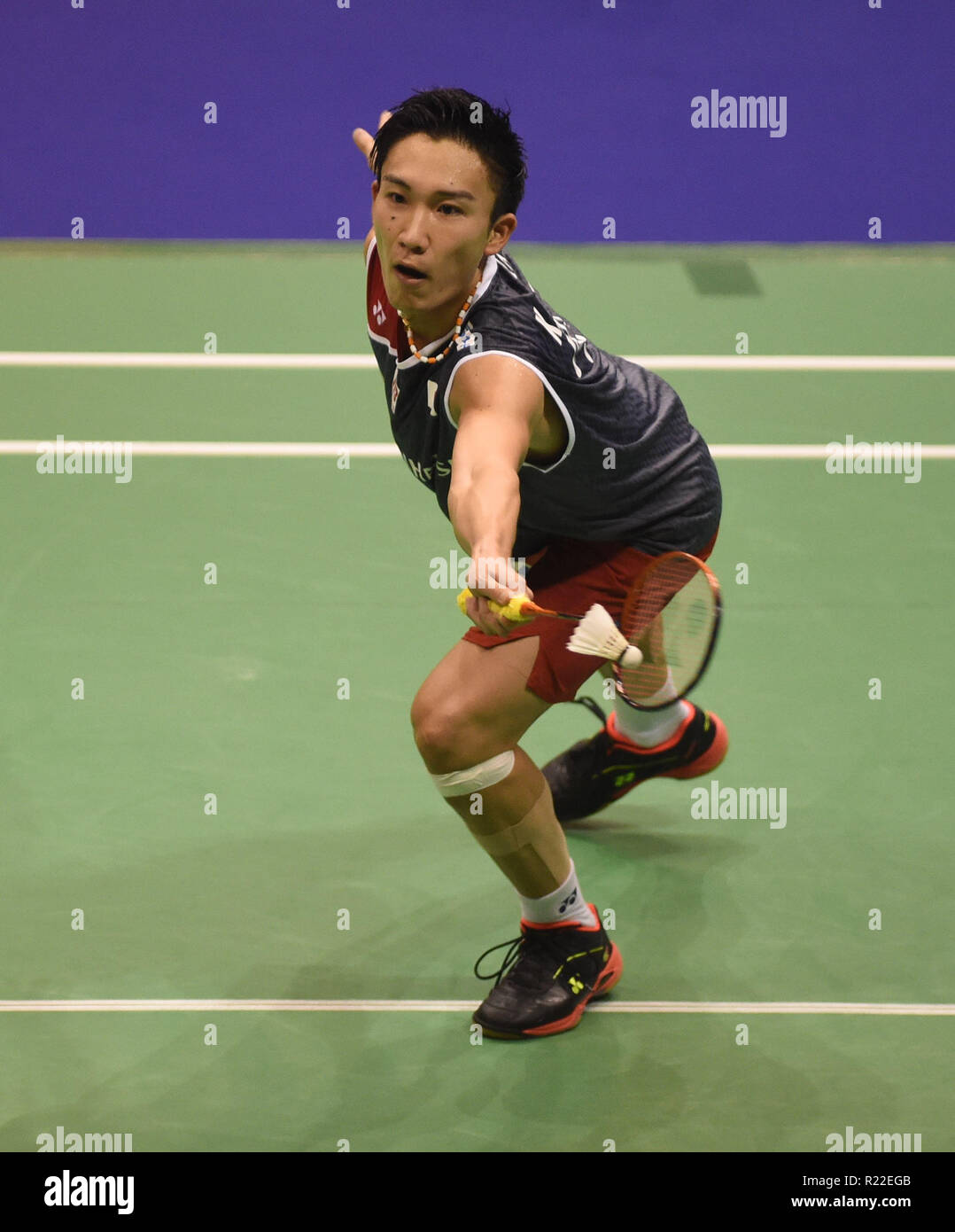 Hong Kong, China. 16th Nov, 2018. Japan's Kento Momota returns the ...