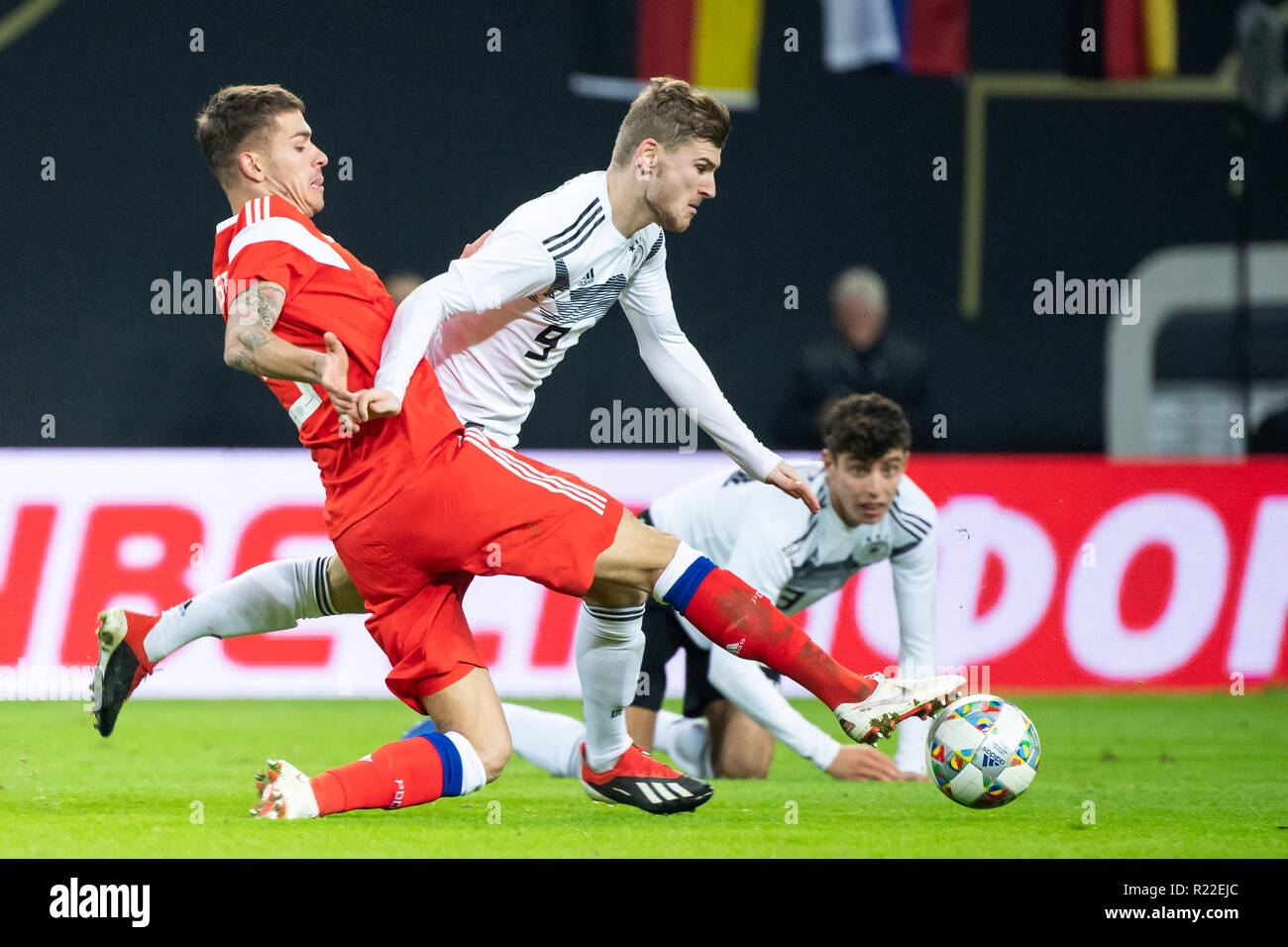 Leipzig, Germany. 15th Nov, 2018. Germany's Timo Werner (C) vies with ...