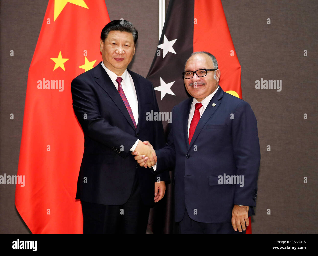 Port Moresby, PNG. 16th Nov, 2018. Chinese President Xi Jinping (L ...