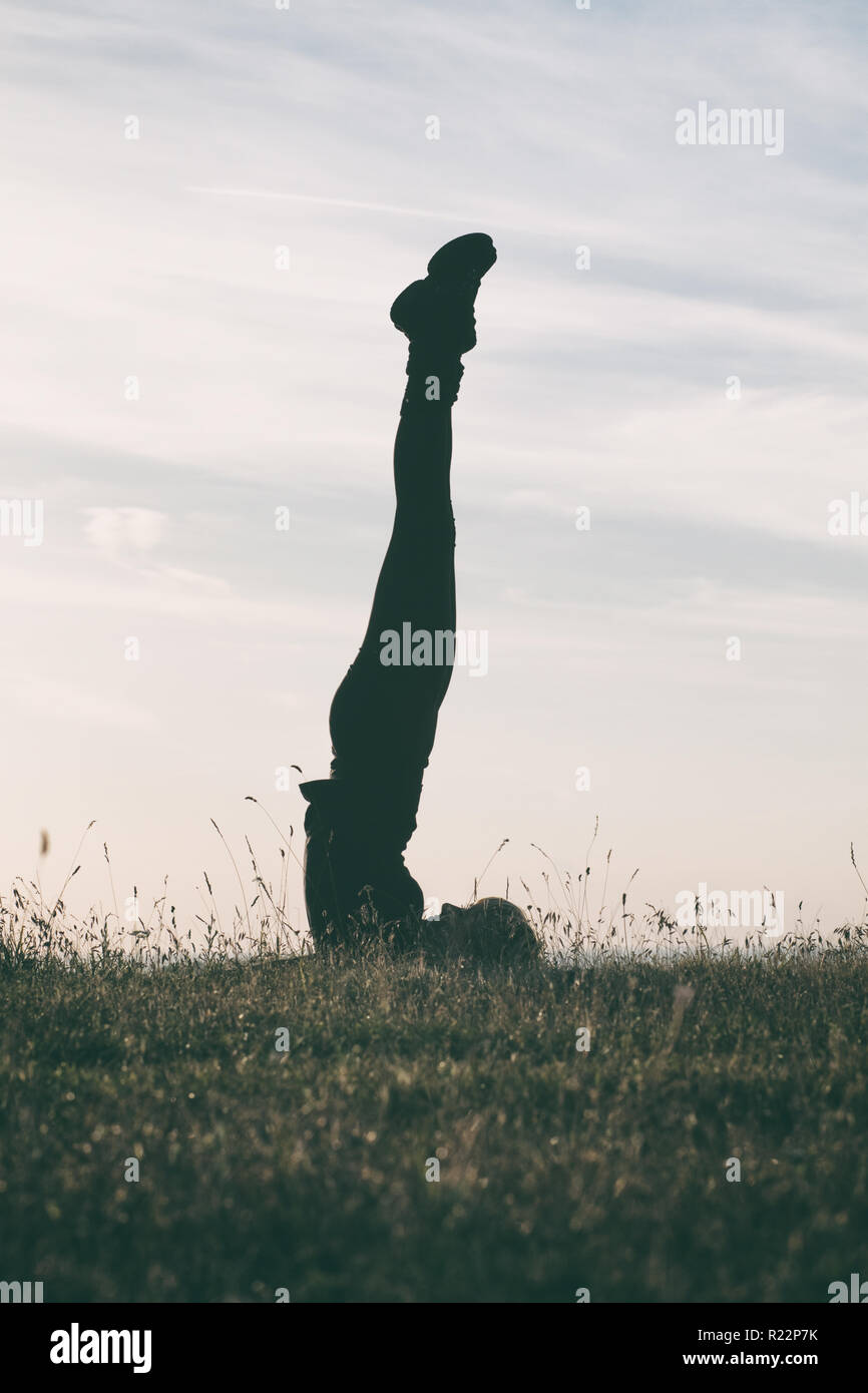 Yoga- Niralamba Sarvangasana/Unsupported shoulderstand Stock Photo - Alamy