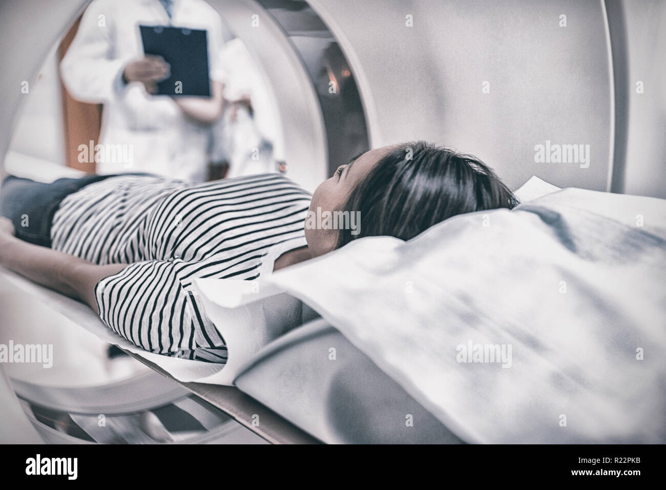 Female patient undergoing CT scan Stock Photo - Alamy