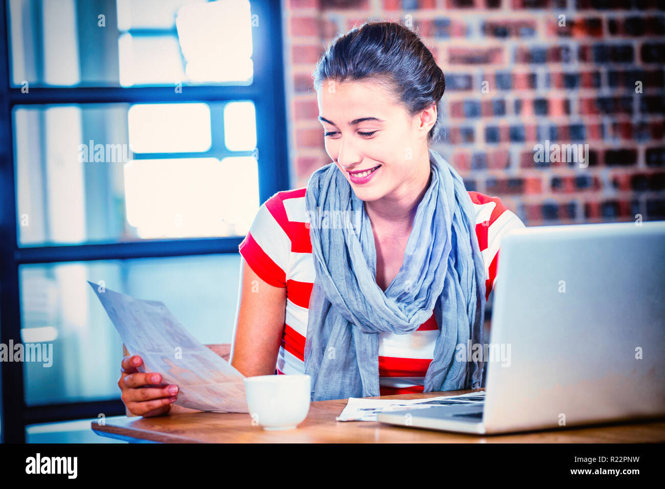 Woman looking at picture chart Stock Photo - Alamy