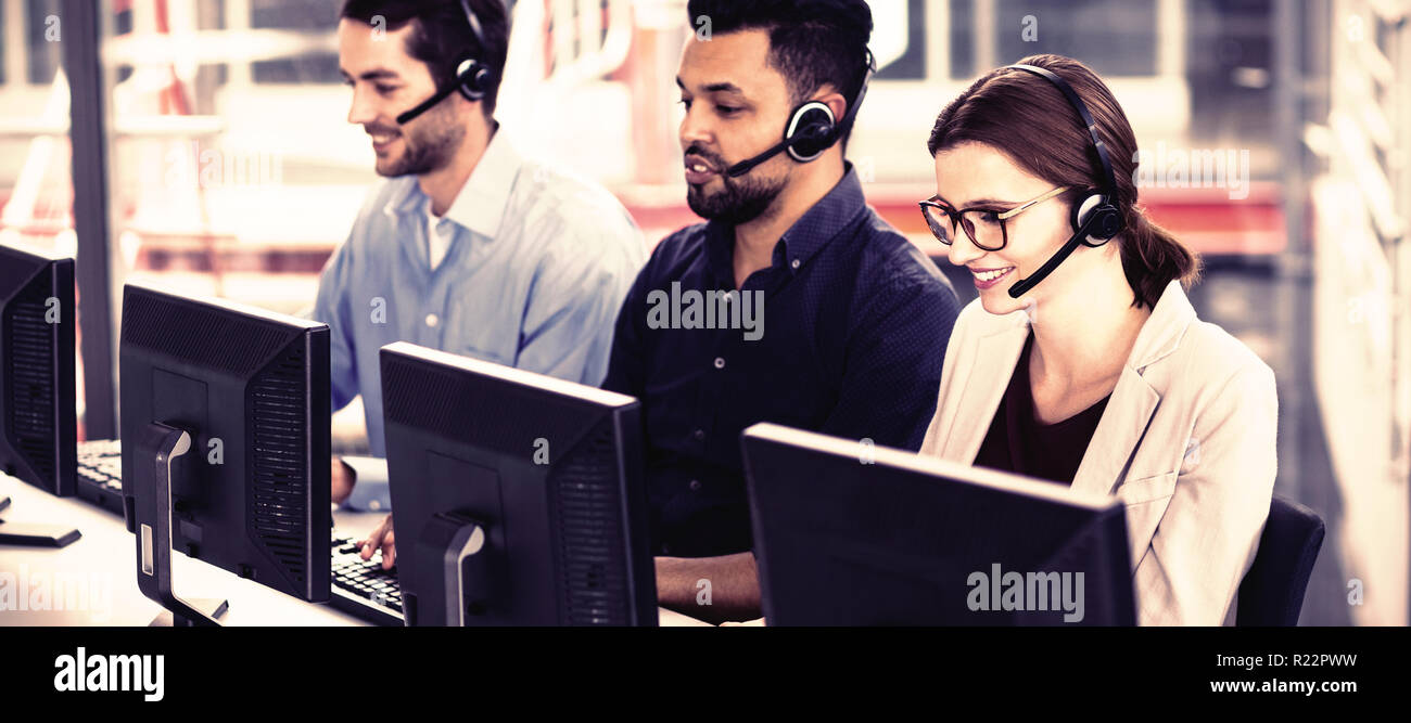 Executives with headsets hi-res stock photography and images - Alamy