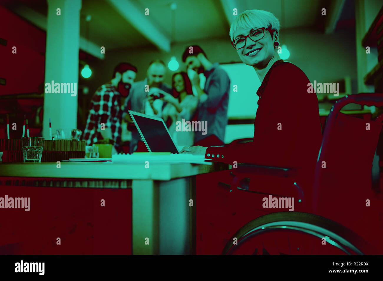 Disabled man using computer typing hi-res stock photography and images ...