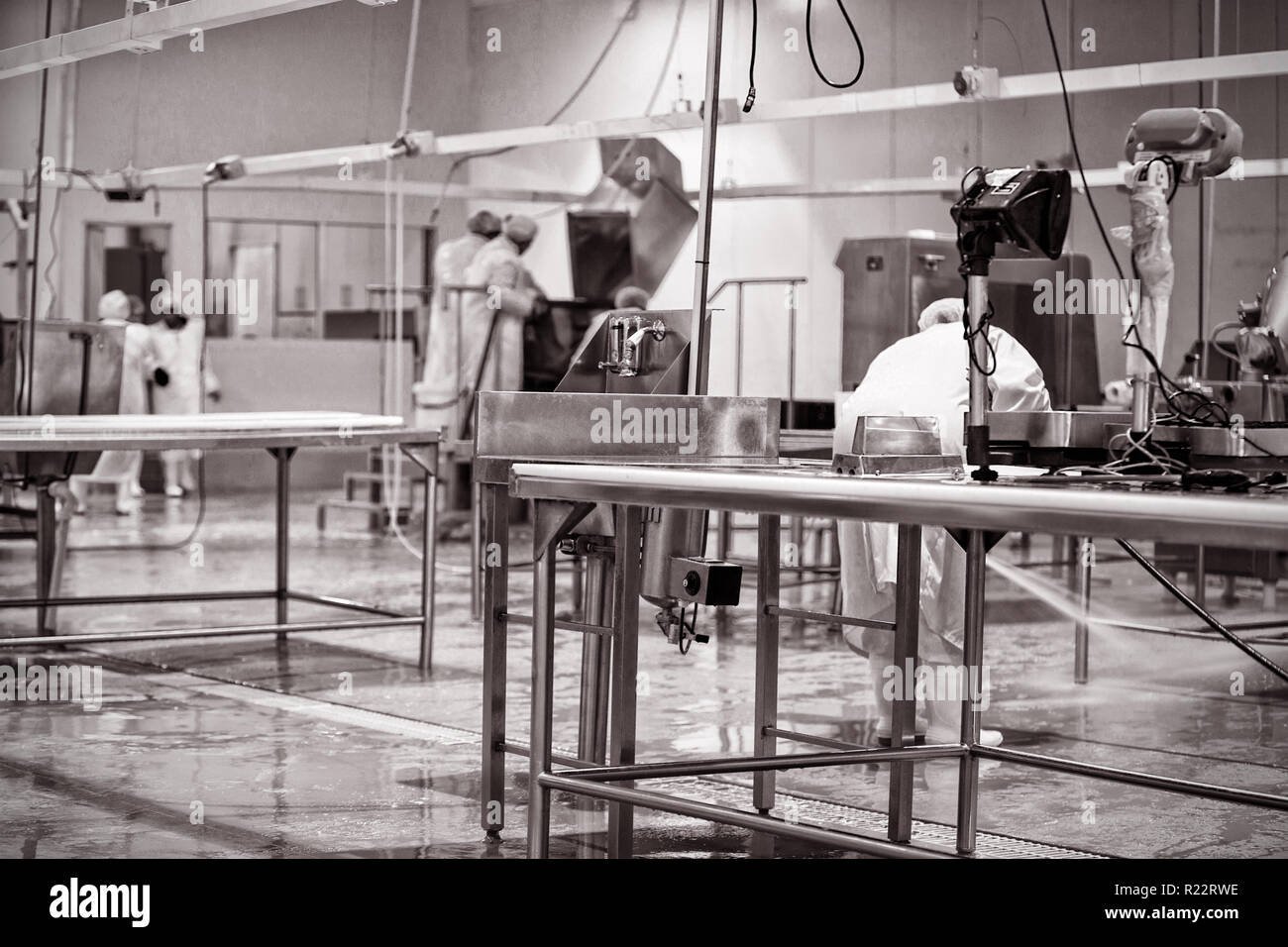 Butcher cleaning the floor Stock Photo - Alamy