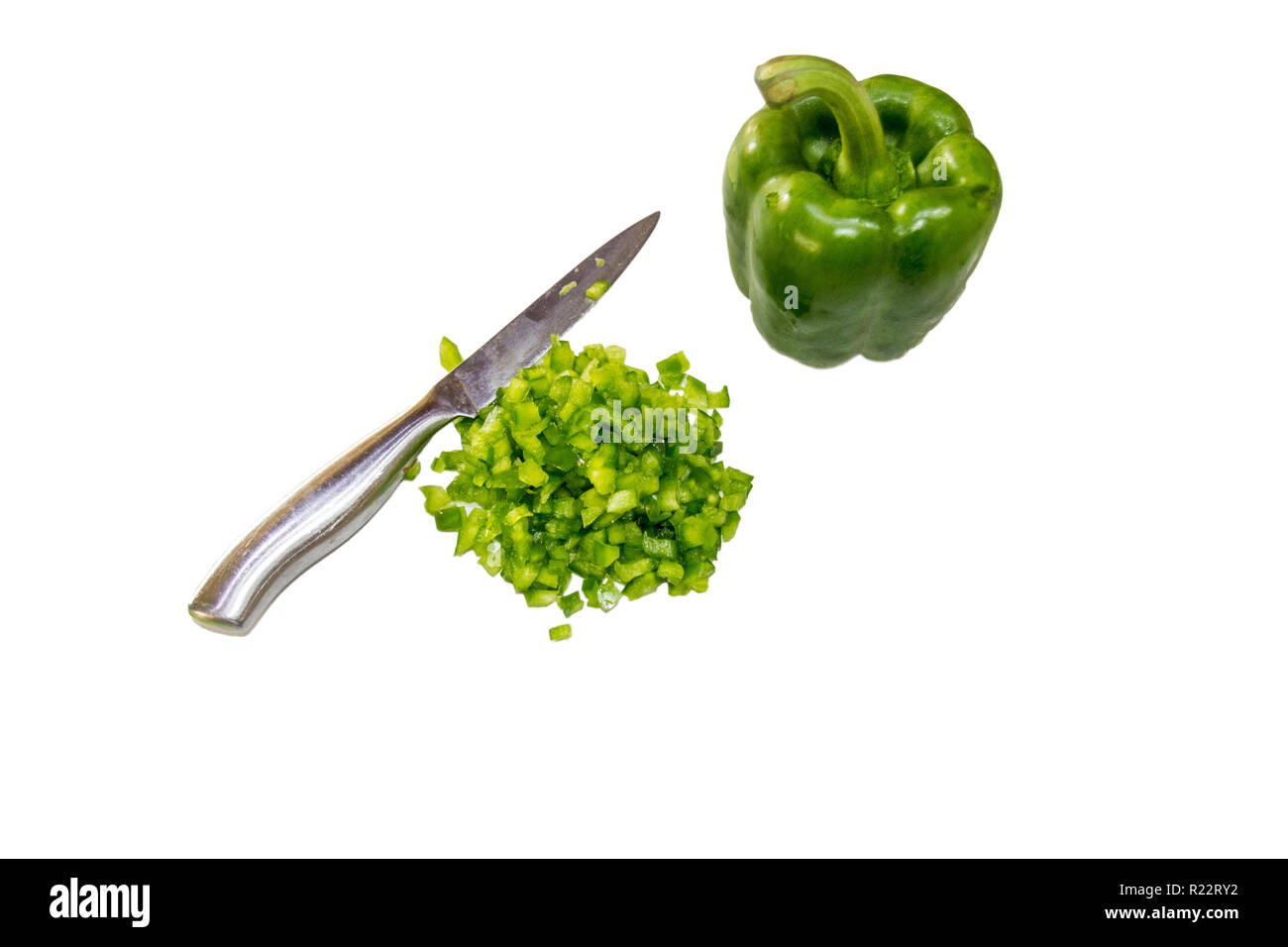 Whole and chopped green capsicums and knife isolated on white ...
