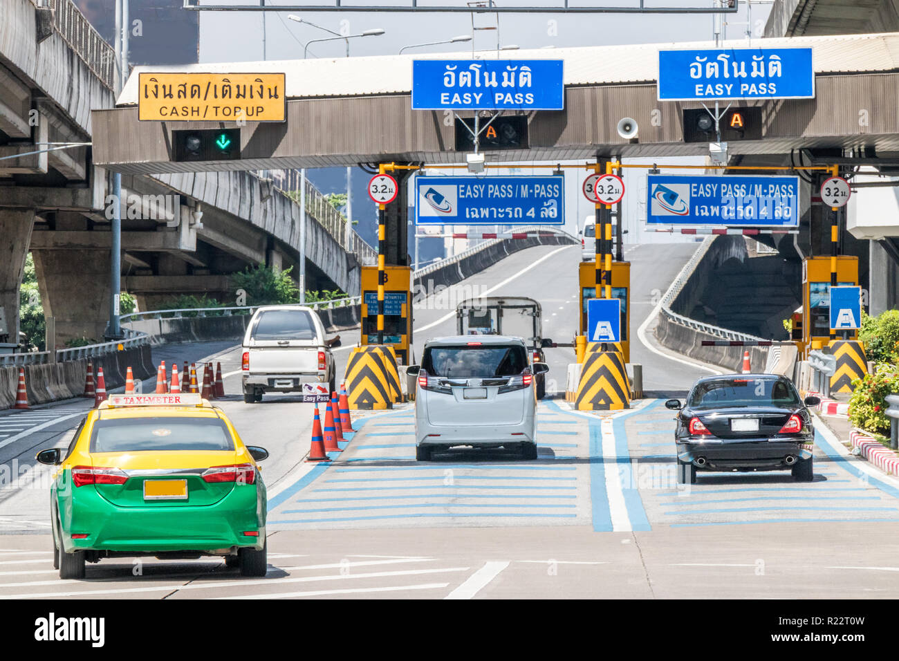 Cars passing through highway toll booths, Bangkok, Thailand Stock Photo ...