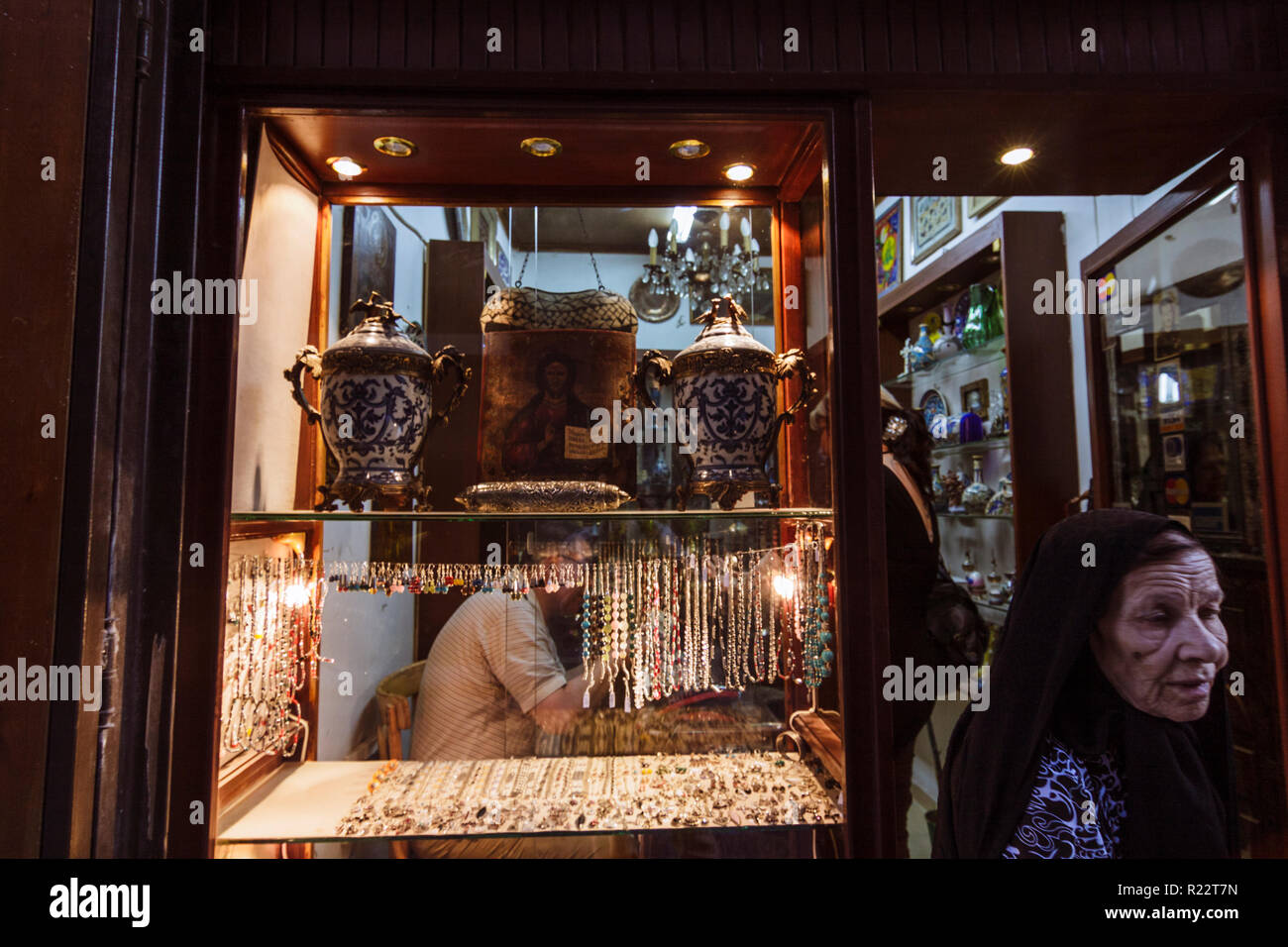 Damascus, Syria : A woman walks out of a Jewellery shop at Al-Hamidiyah ...