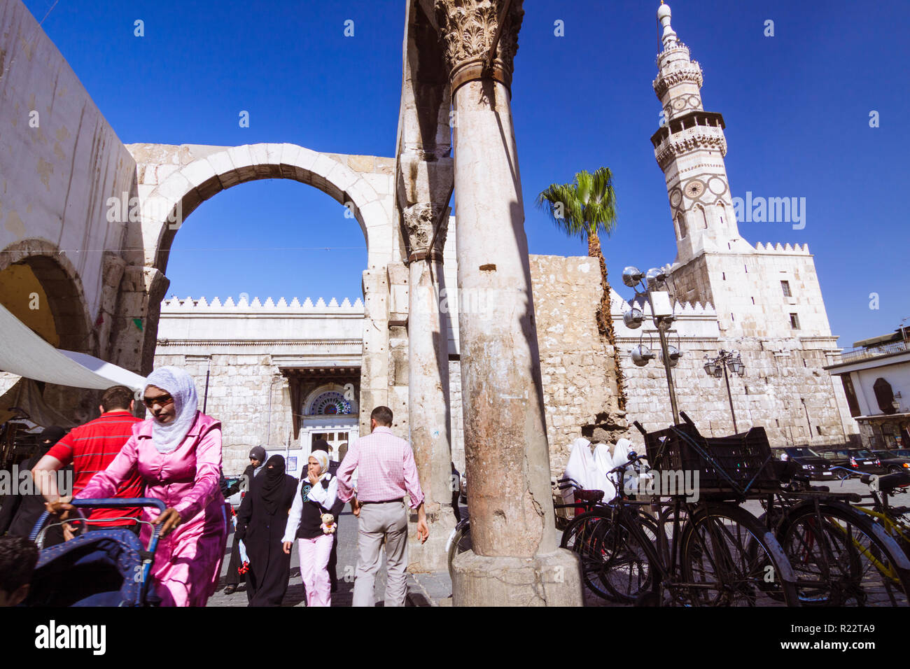 Damascus, Syria : People walk under the ruins of the Roman Jupiter ...