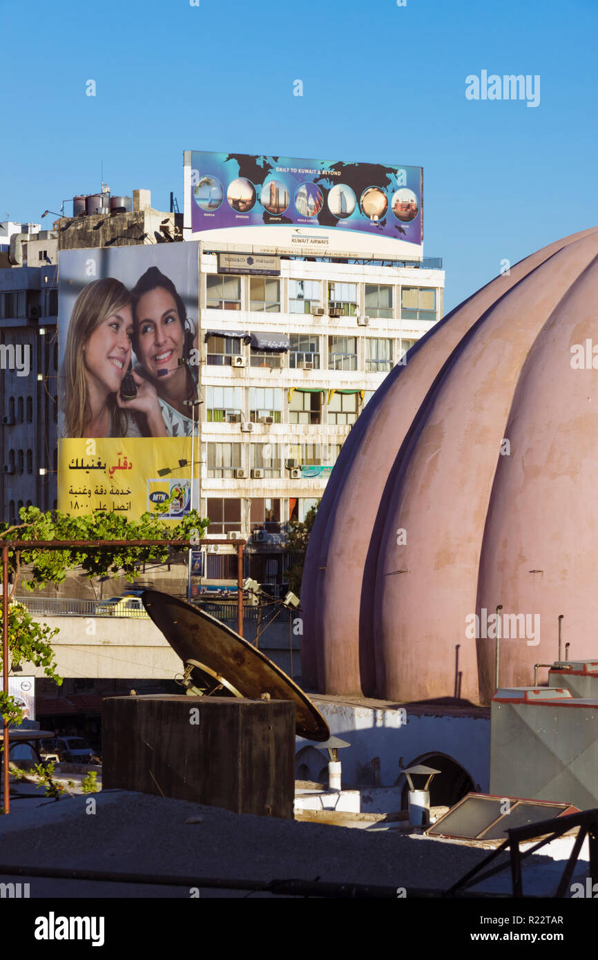 Damascus, Syria : Cityscape with old dome and modern billboard Stock ...