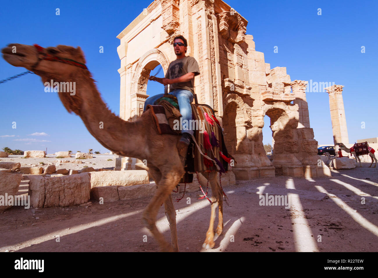 Palmyra, Homs Governorate, Syria - May 27th, 2009 : A man rides a camel ...