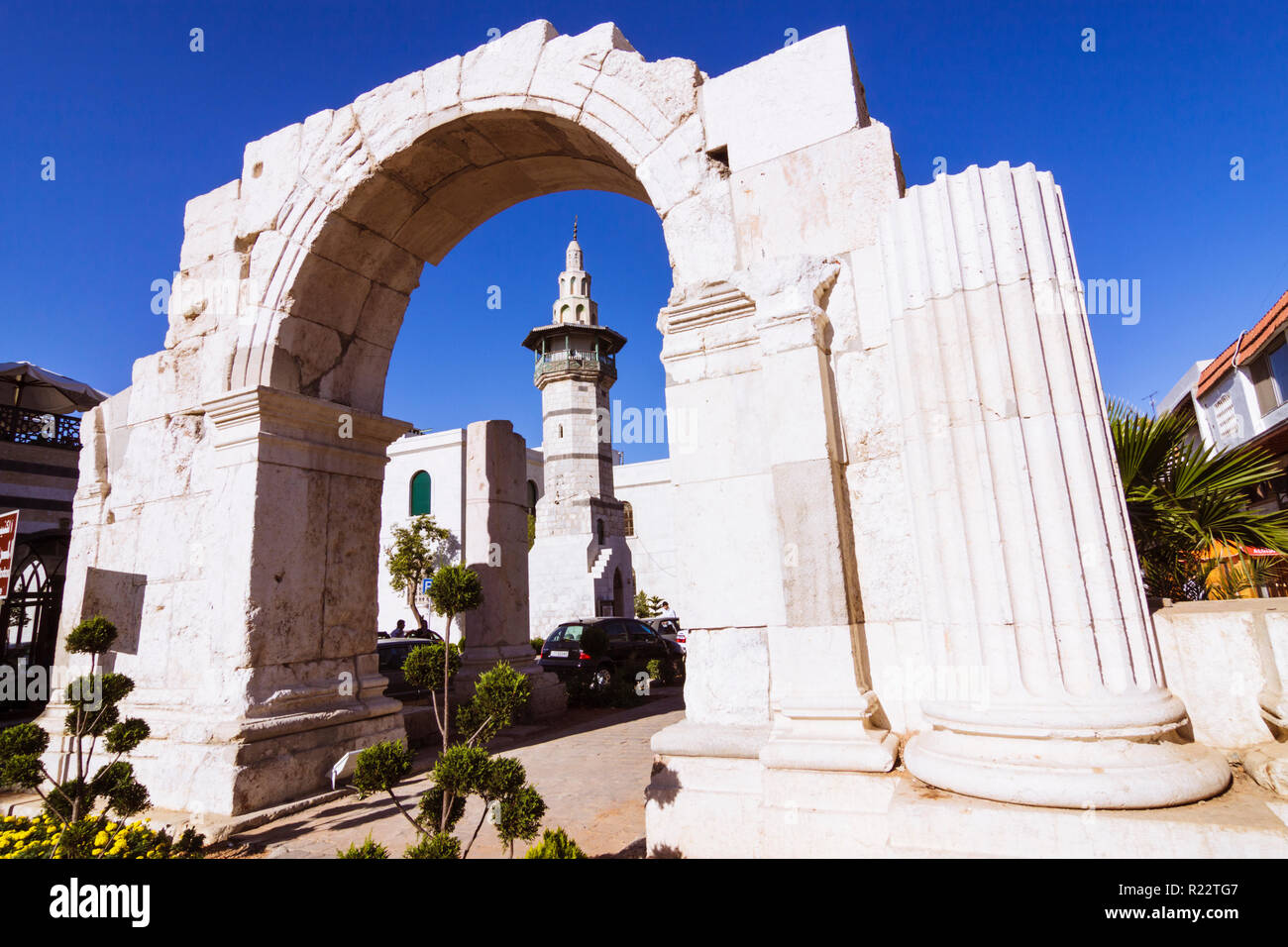 Damascus, Syria : Roman triumphal arch and minaret at one end of the ...