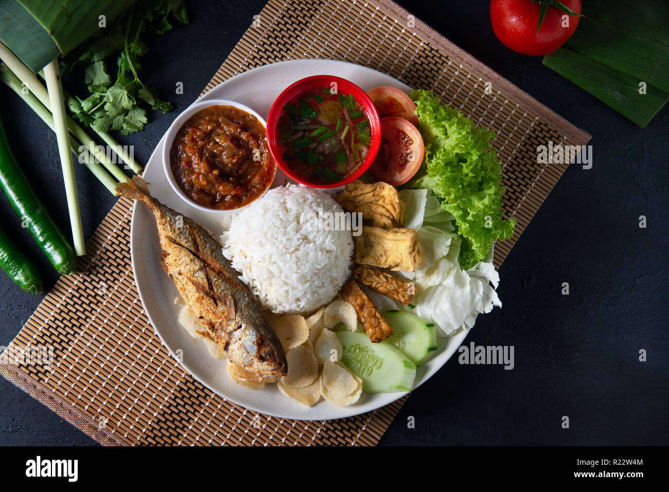 indonesian mackerel fried with rice Stock Photo - Alamy